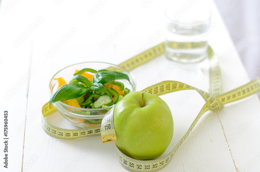 healthy eating, dieting, slimming and weigh loss concept - close up of ...