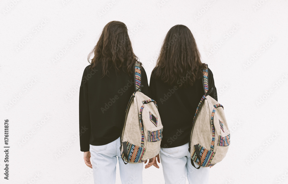 students twins with backpacks Stock Photo | Adobe Stock