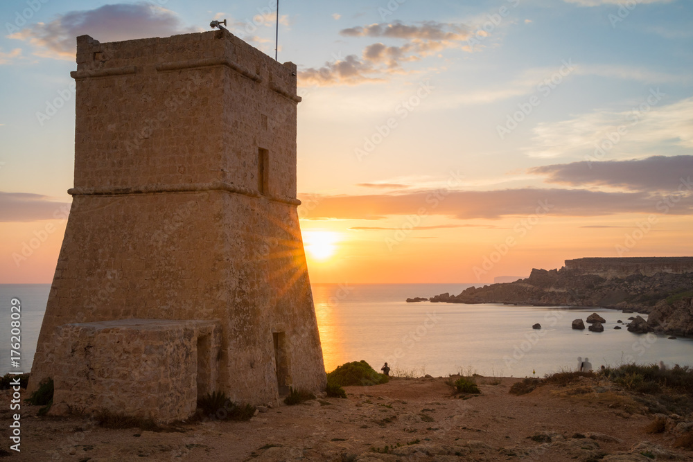 Beautiful golden sunset at Ghajn Tuffieha Tower, above Golden Bay ...