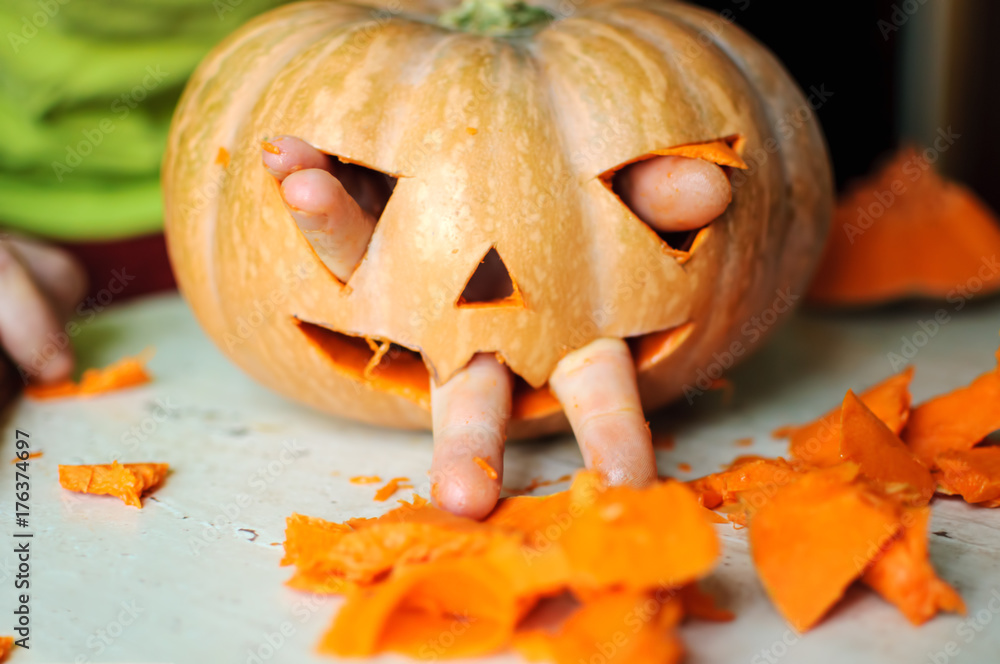 Process of making Jack-o-lantern. Funny picture of Halloween pumpkin ...