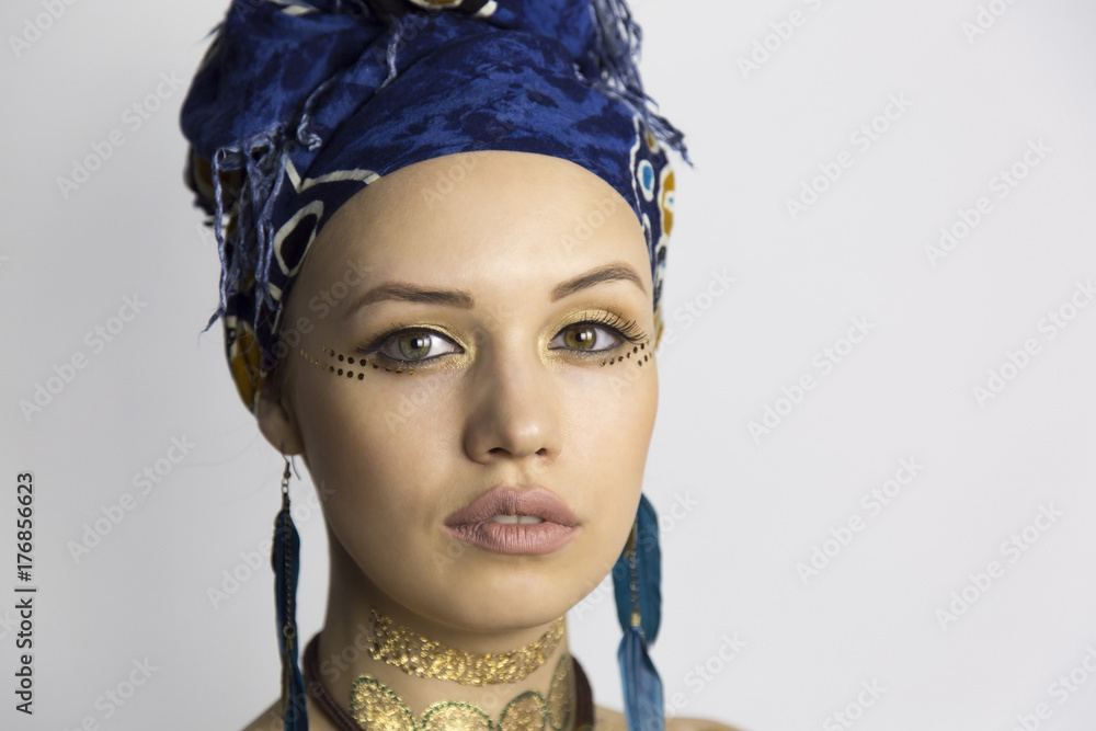 Oriental girl in African clothes Arab girl in an African style dress ...