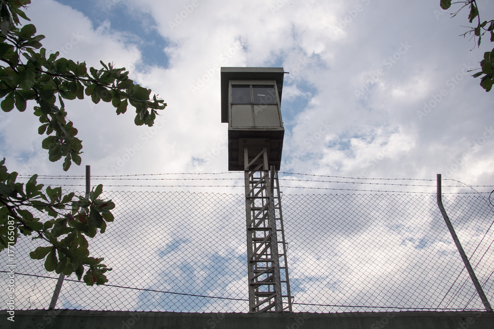 Surveillance tower at prison Stock Photo | Adobe Stock