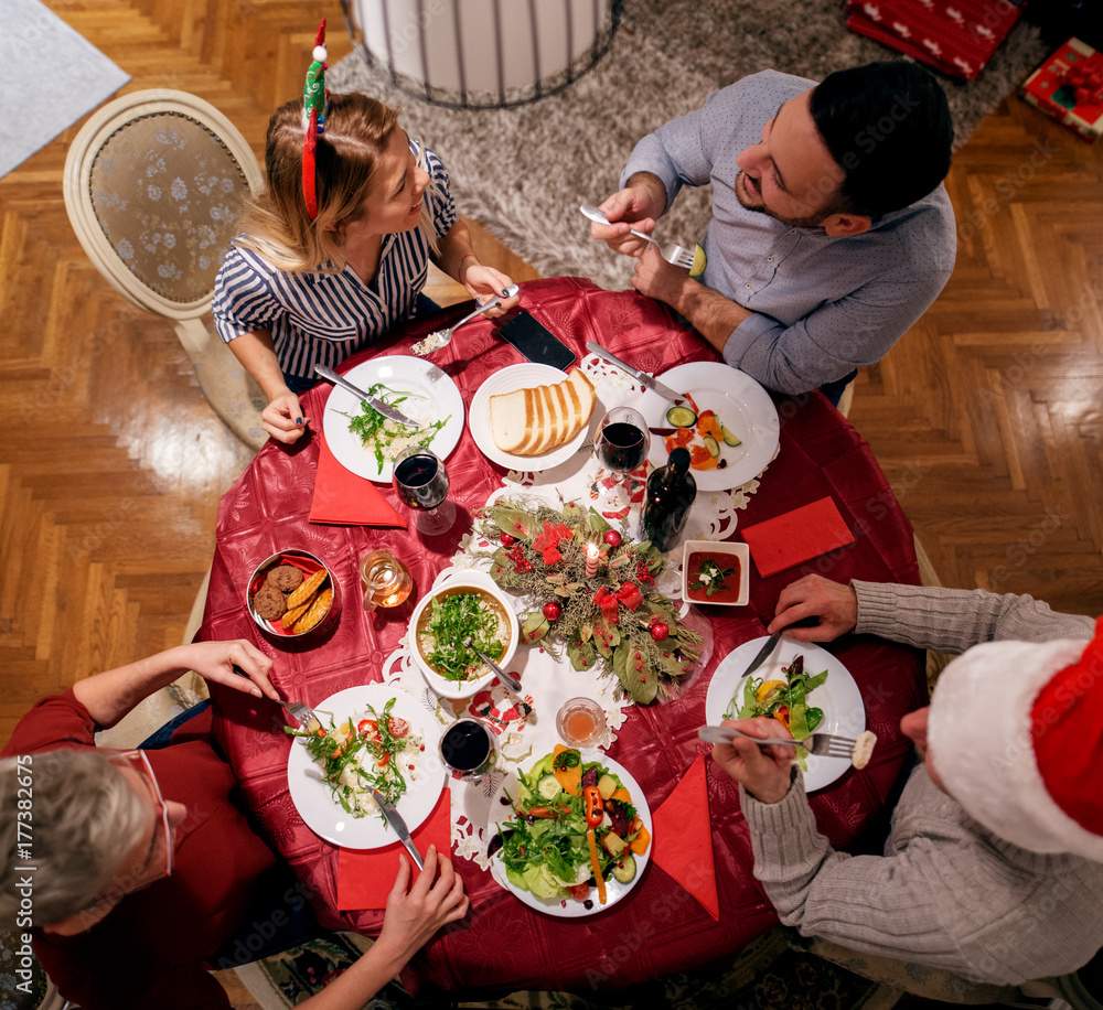 Top view of the table while family celebrating Christmas together ...