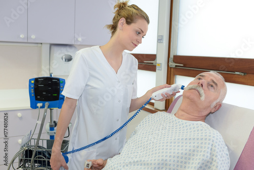 nurse shaving senior man at the hospital Stock Photo | Adobe Stock nurse shaving senior man at the hospital Stock Photo | Adobe Stock
