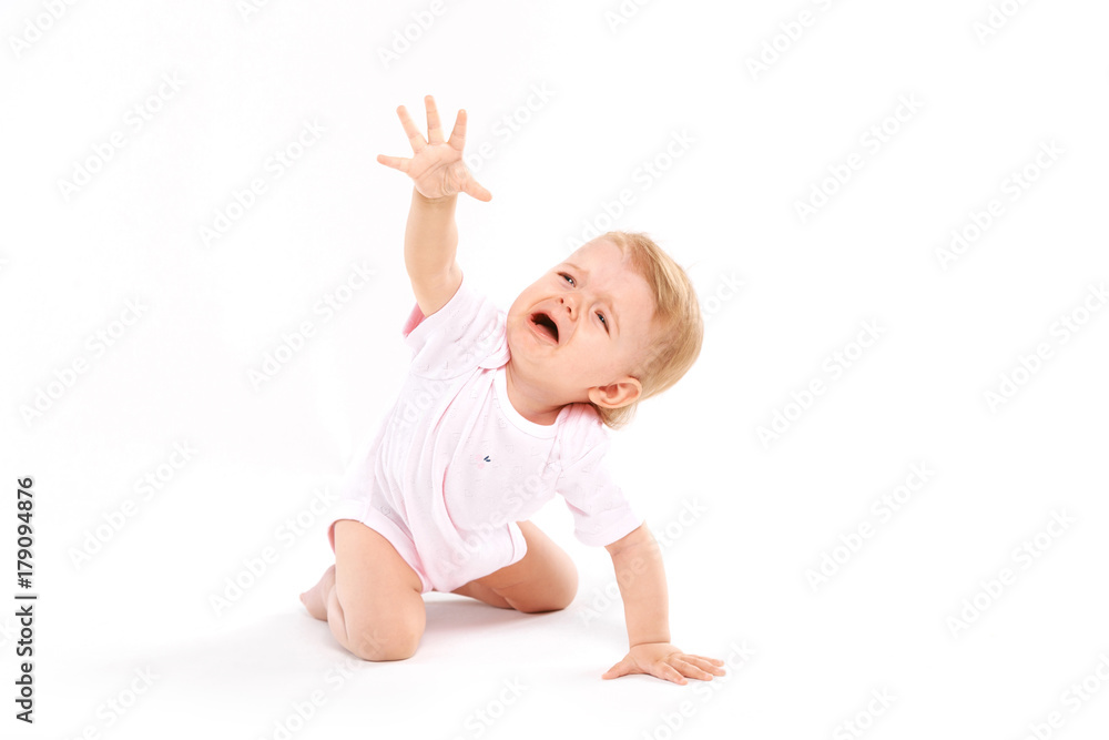 Crying boy with his hand raised Stock Photo | Adobe Stock