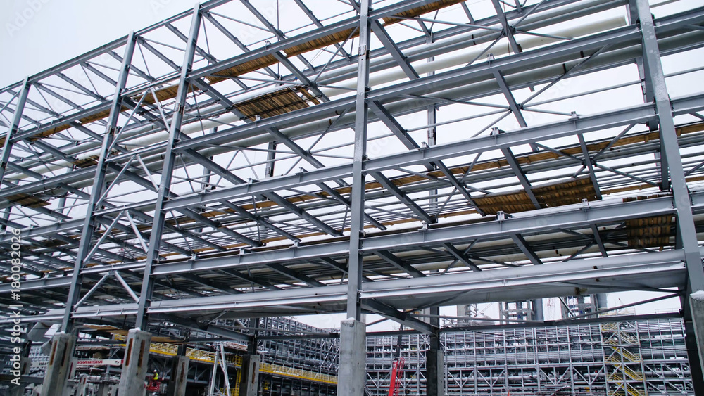 Scaffolding installation at a tank with process structures of refinery ...