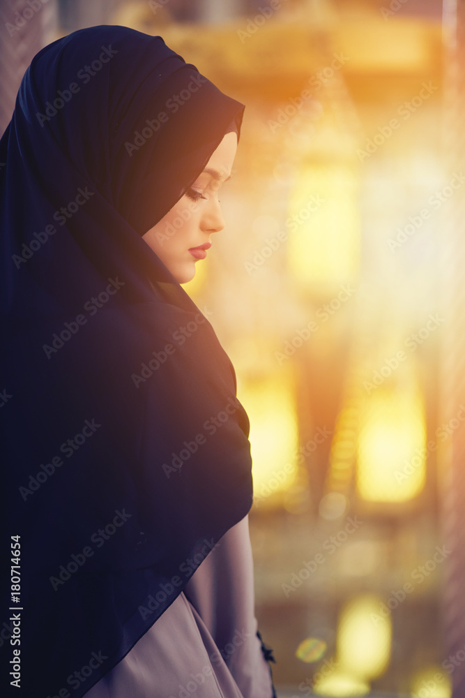 muslim woman praying in mosque Stock Photo | Adobe Stock