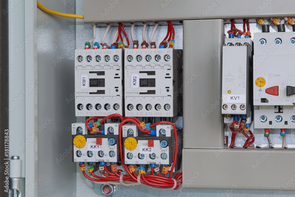 Magnetic starters with thermal relays connected by wires. Starters ...