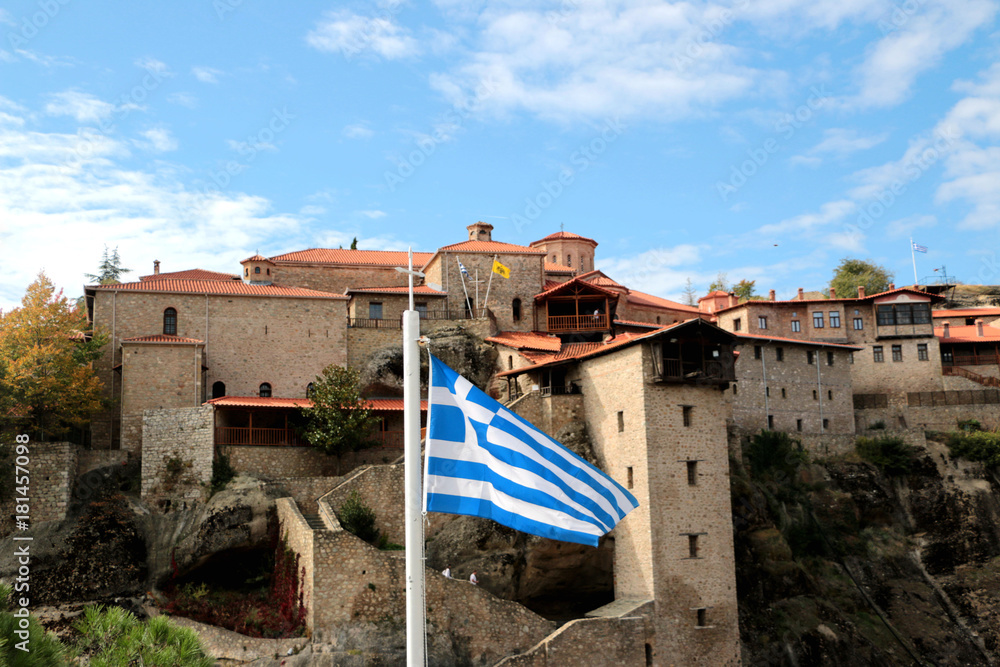 Greece. Meteora. The Greece flag with the Holy Monastery of Great ...