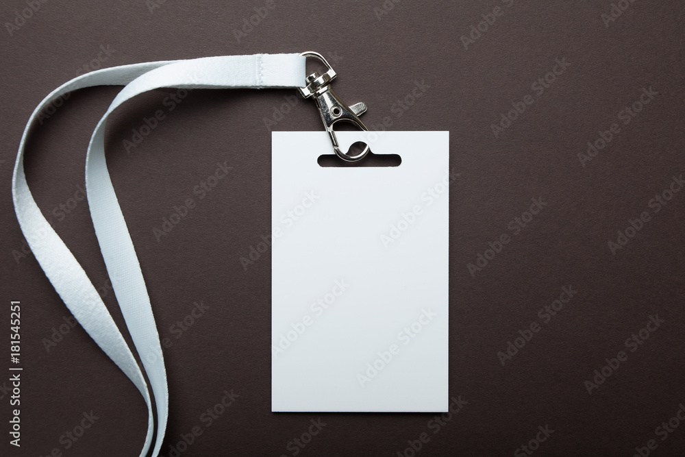 Empty blank badge identification card with white neckband isolated on ...