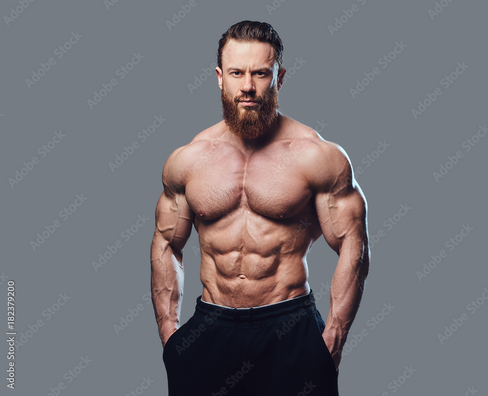 Portrait of bearded shirtless bodybuilder. Stock Photo | Adobe Stock