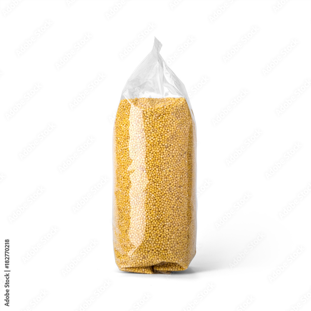 Millet groats in transparent plastic bag isolated on white background ...