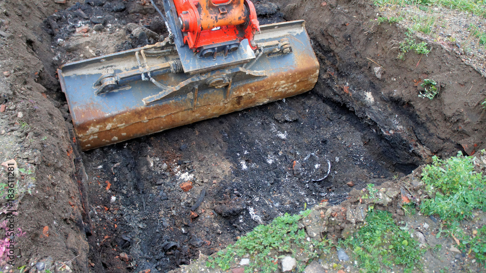 Garbage from a former garbage dump in the construction area (old ...