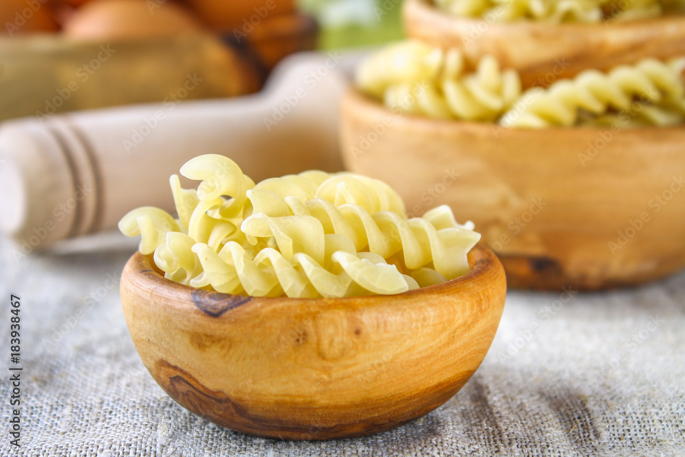 Helix- or corkscrew-shaped pasta. Rotini macaroni. Related to fusilli ...
