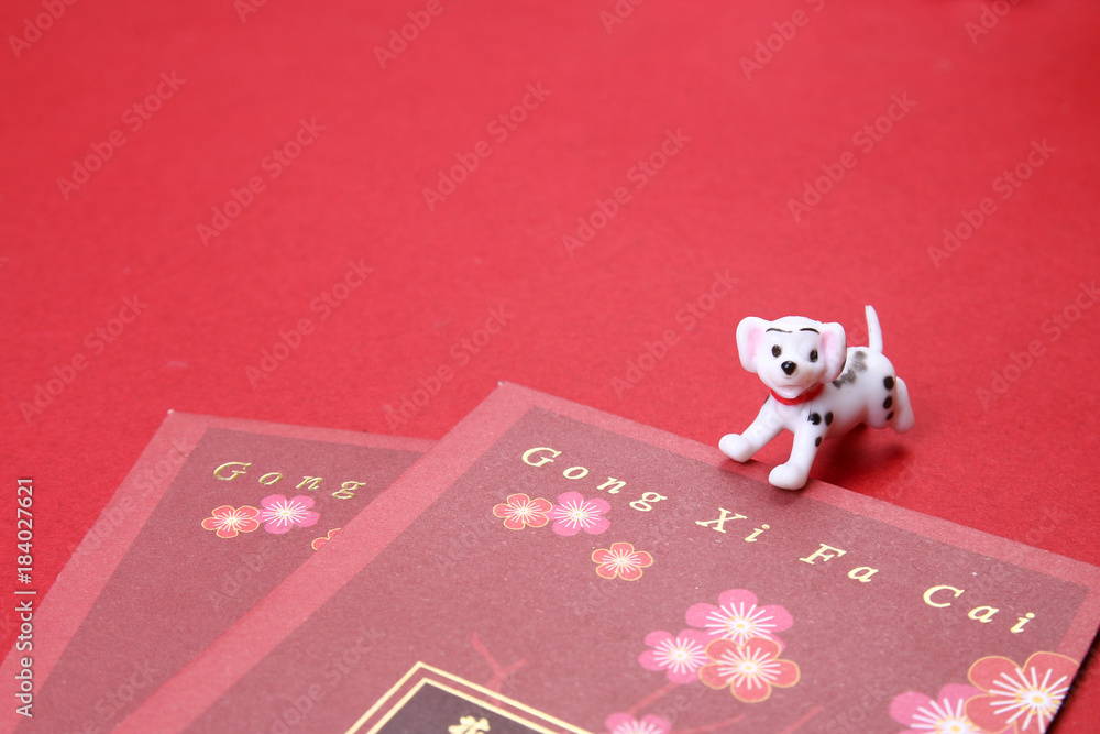 Miniature dogs with chinese new year andpow red packets. 2018 is the ...