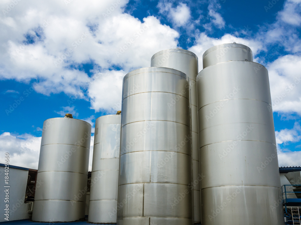 Cylindrical Steel Tanks On Dairy Factory Stock Photo | Adobe Stock
