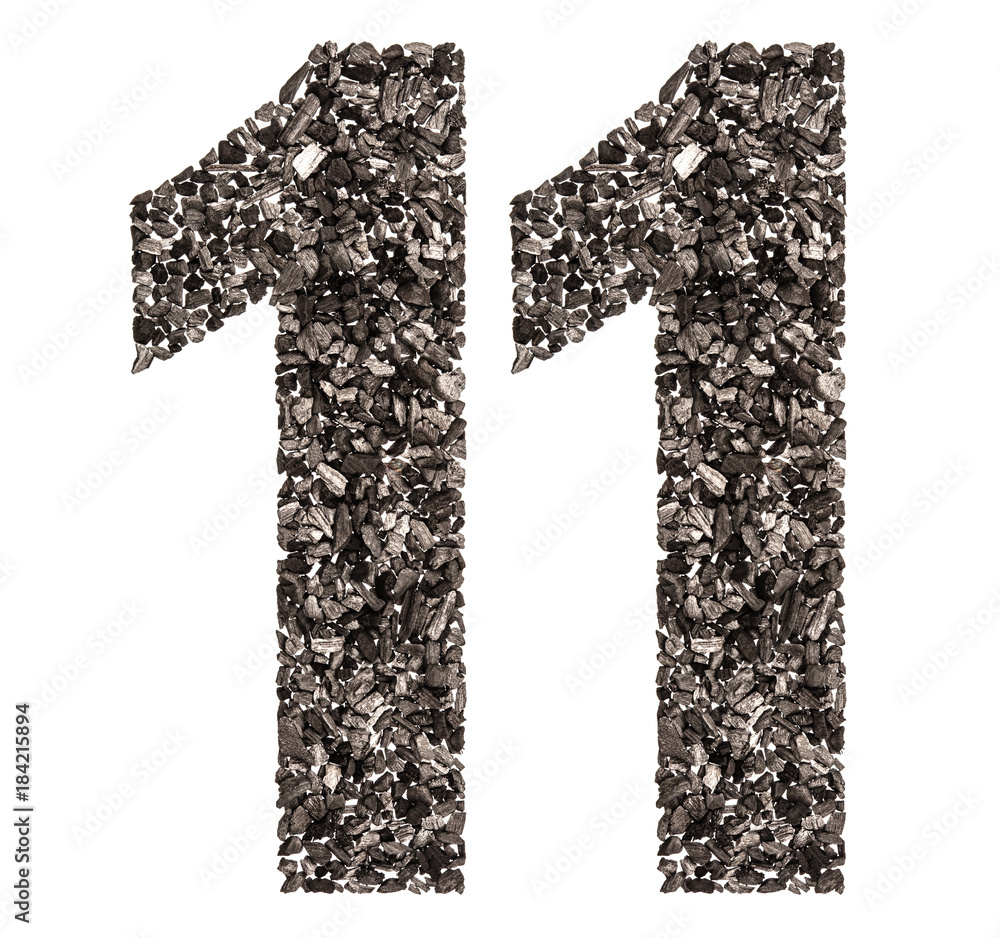 Arabic numeral 11, eleven, from black a natural charcoal, isolated on ...