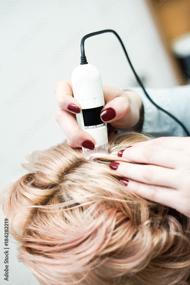 Hair doctor checking hair. Diagnostics hair and scalp.Trihoskopiya ...