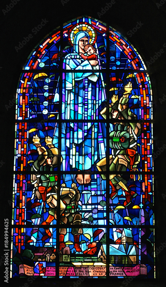Stained glass window in the church of Sainte-Mere-Eglise, Normandy ...