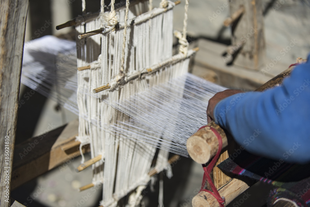 woman weaver in Nepal, the city of Manang. Mustang, Himalayas, December ...