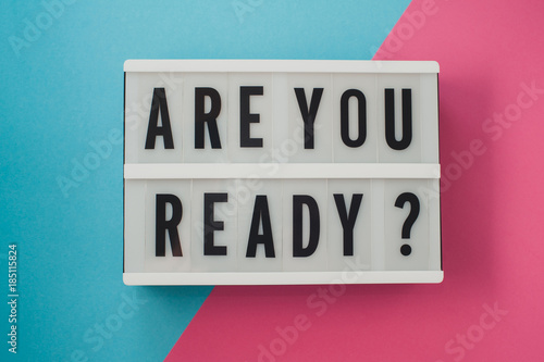 Are you ready - text on a display on blue and pink bright background ...