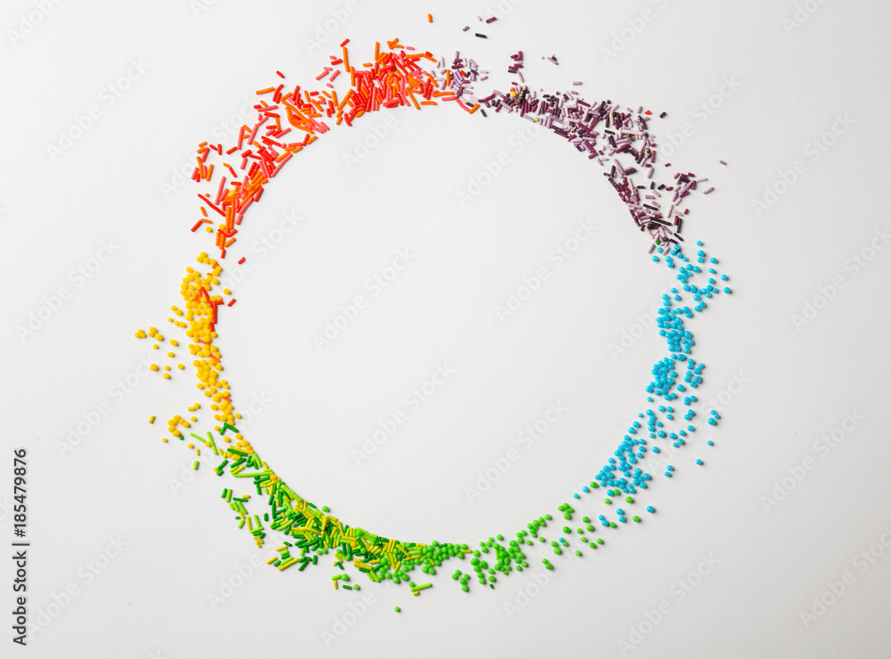 Many rainbow sprinkles in shape of circle on white background Stock ...
