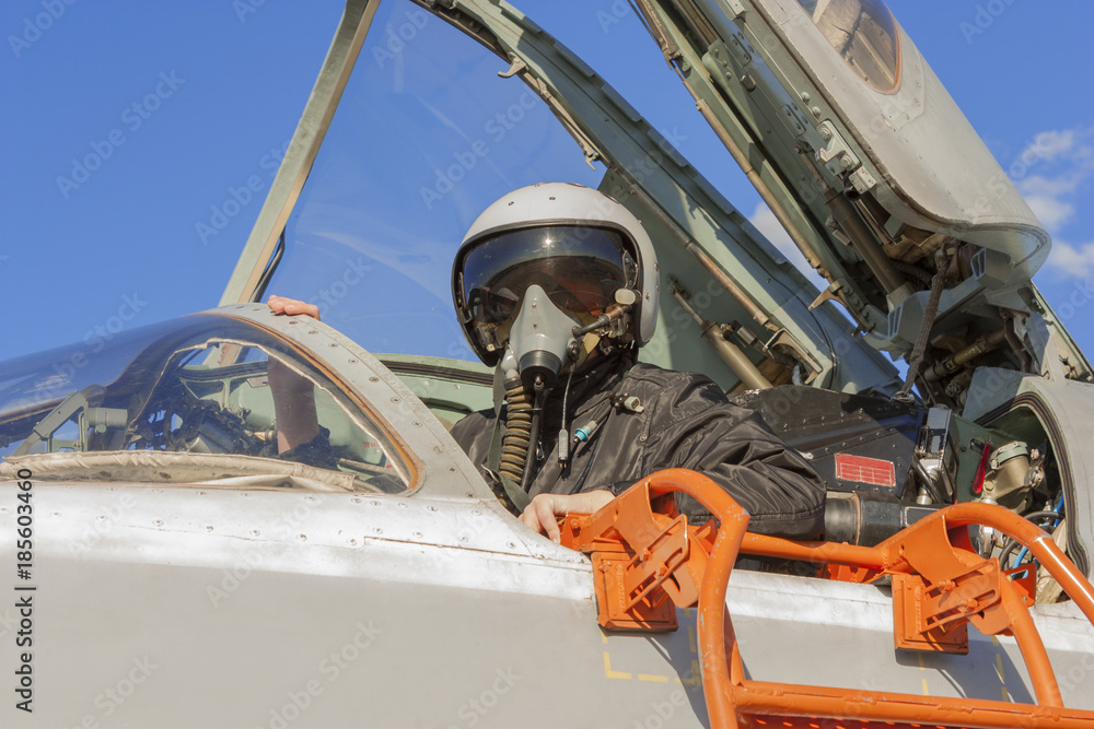 Military pilot in the cockpit of a jet aircraft Stock Photo | Adobe Stock