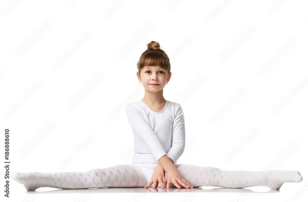 Young sport brunette girl do splits workout stretching exercises in ...