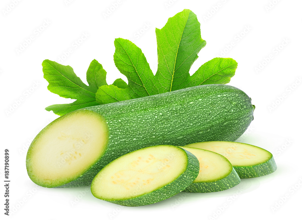 Isolated zucchini. One cut courgette with leaves isolated on white ...