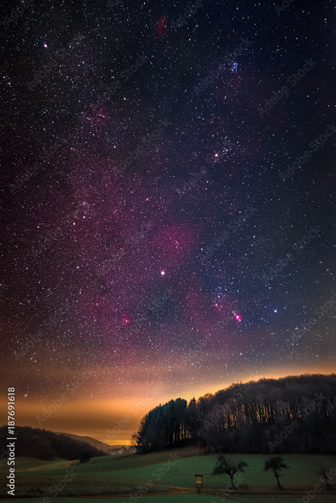 Winter night sky including Barnard’s Loop, the Orion Nebula, the Flame ...
