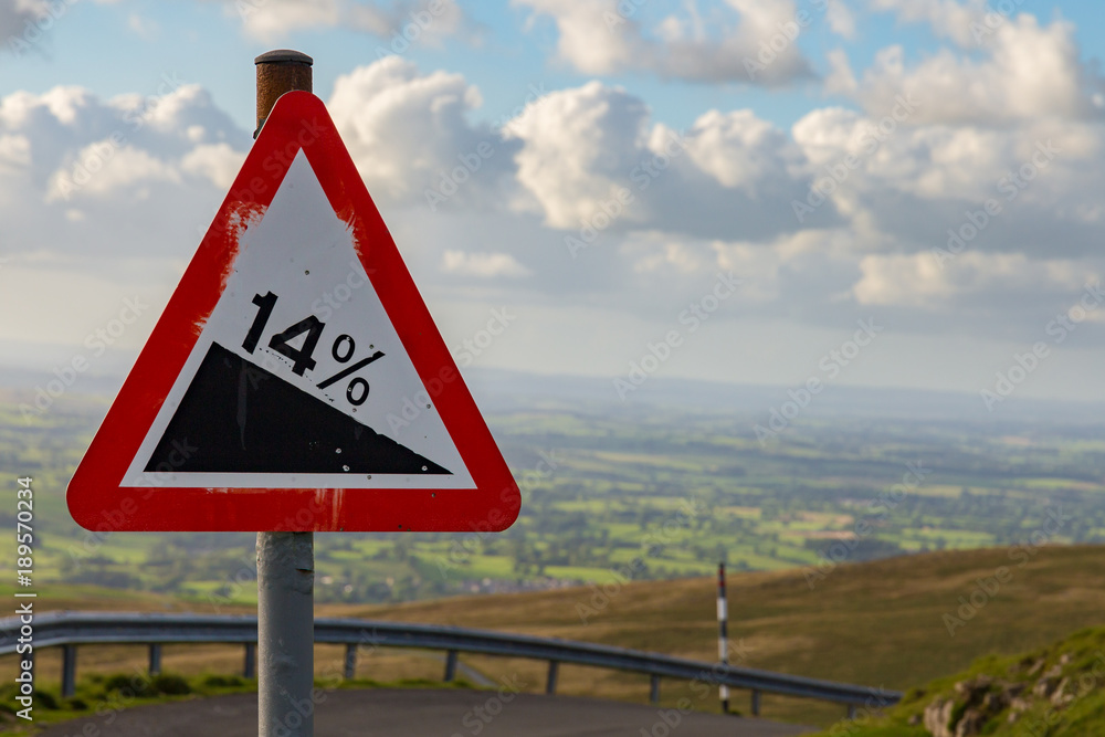 Sign: 14% descent, seen on the B6270 road between Kirkby Stephen and ...