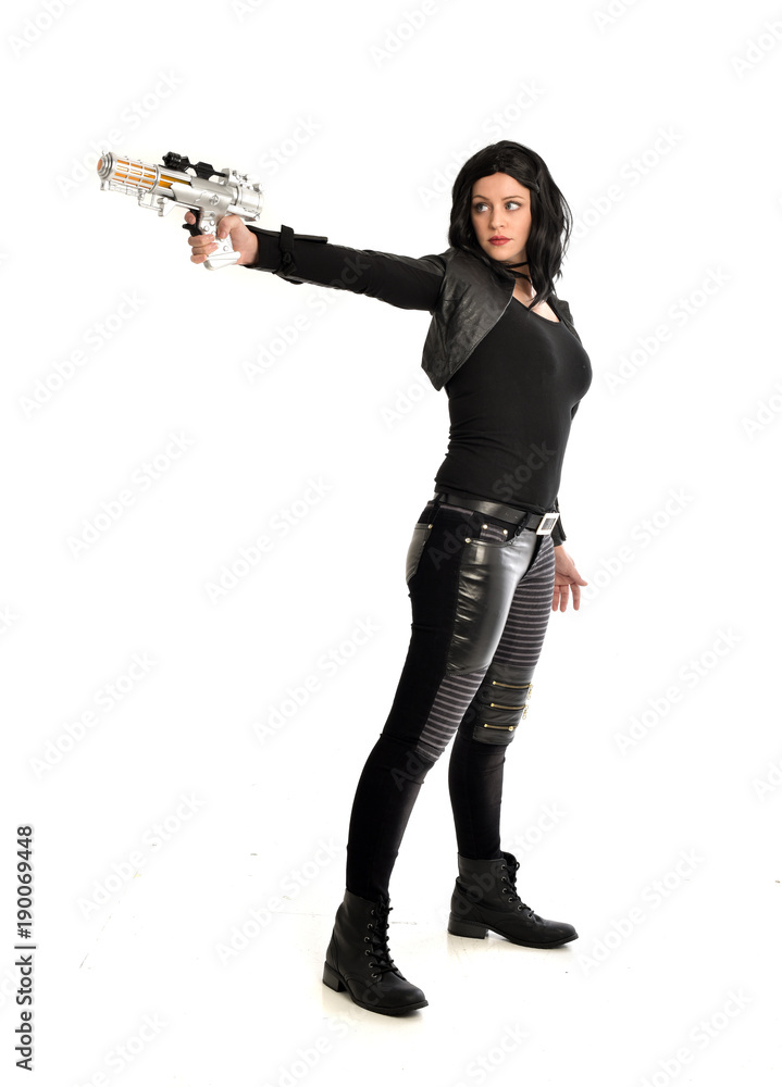 Woman Standing With Gun