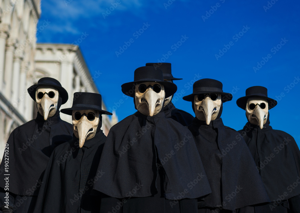 ภาพถ่าย Stock Plague Doctor Masks group, traditional costume invented ...