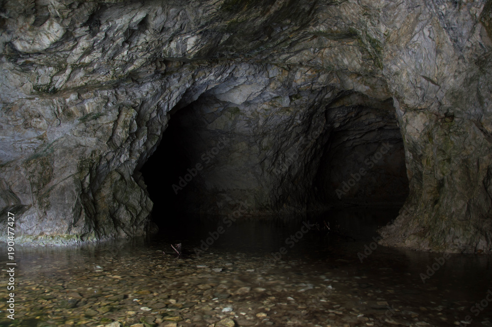 Underground view - a cave inside with an underground river Stock Photo ...