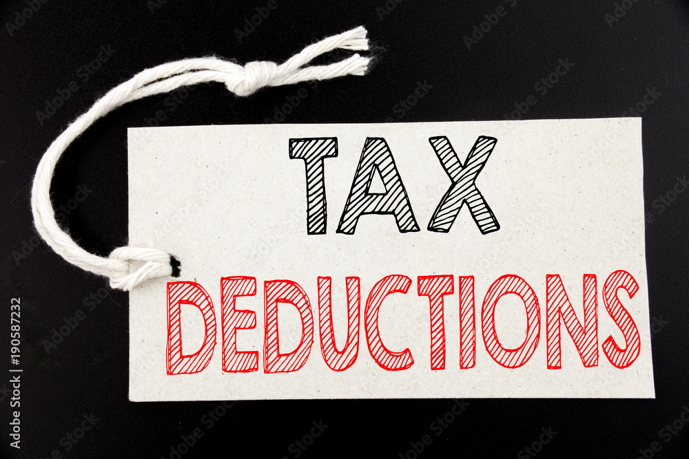 Handwritten text caption showing Tax Deductions. Business concept ...