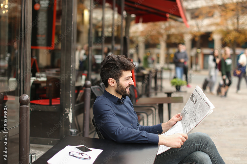 journalist enjoying with reading newspaper columns and articles with ...