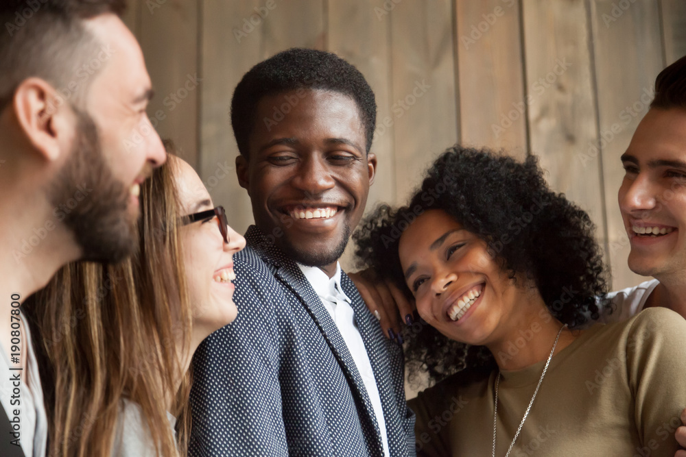 Happy diverse black and white people group with smiling faces bonding ...