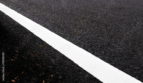 white solid line. Road markings on asphalt on the street. Stock Photo ...