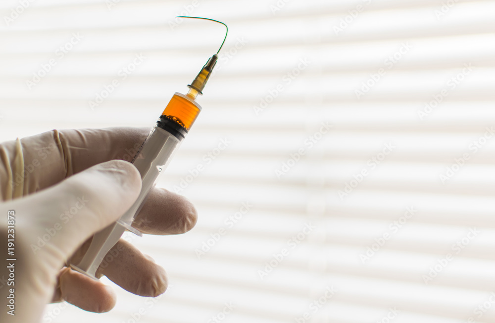 Syringe with a bent needle. The concept of medical error. Stock Photo ...