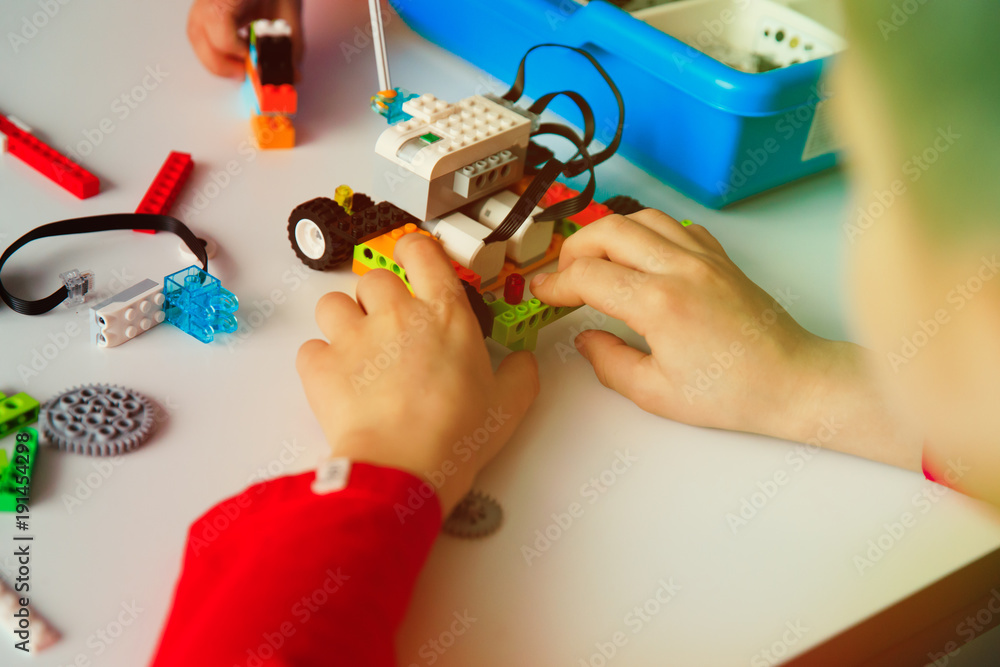 kids building robot at robotic technology school lesson Stock Photo ...