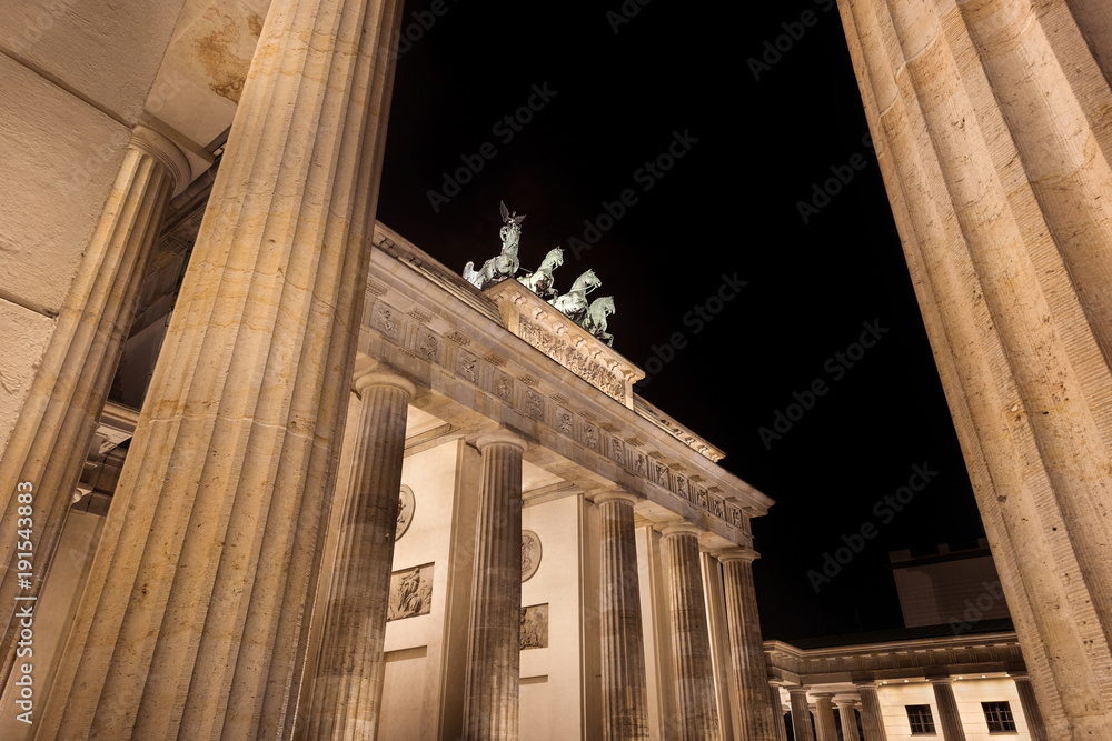 Germany, Berlin, Pariser Platz: Detail of illuminated Brandenburg Gate ...