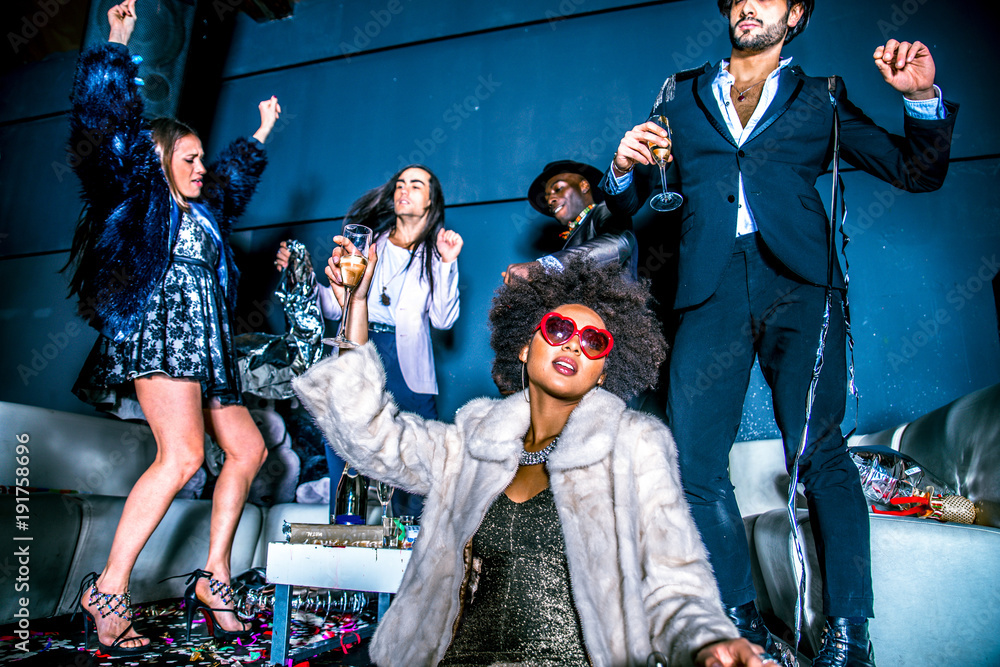 Friends having party in a nightclub Stock Photo | Adobe Stock