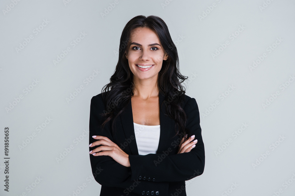 Perfect business lady. Beautiful young businesswoman looking at camera ...