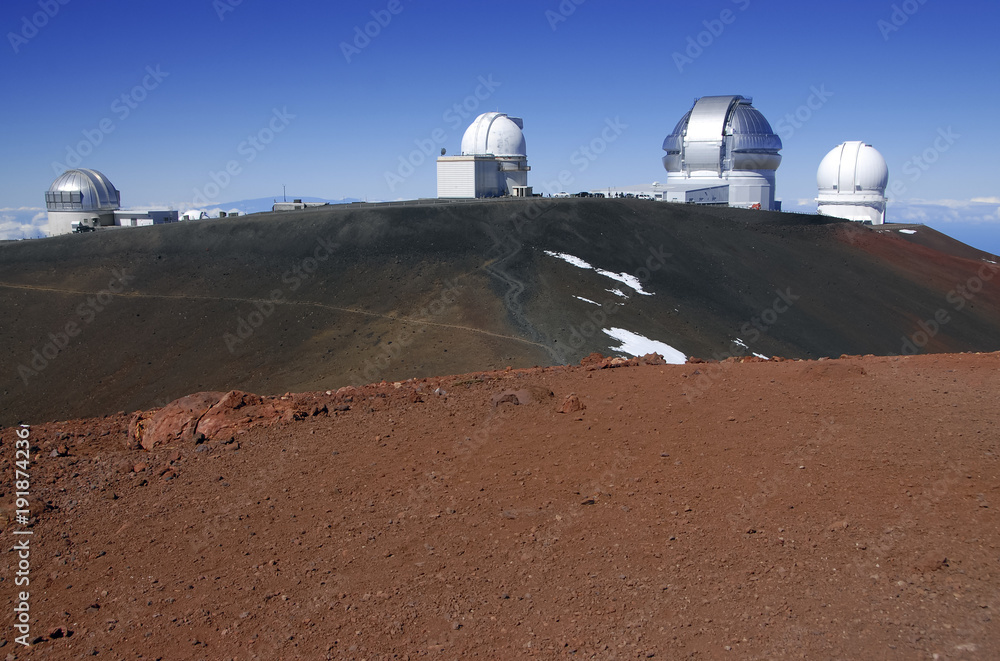 Red sands of Mauna Kea volcano, a popular mountain to hike and climb on ...