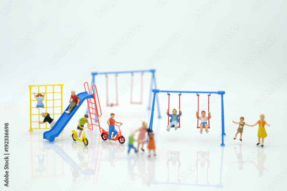 Miniature people : Children are enjoy playing together at the ...
