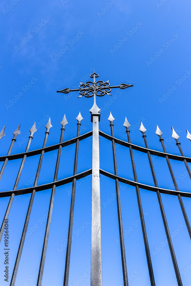 Iron gate with cross Stock Photo | Adobe Stock