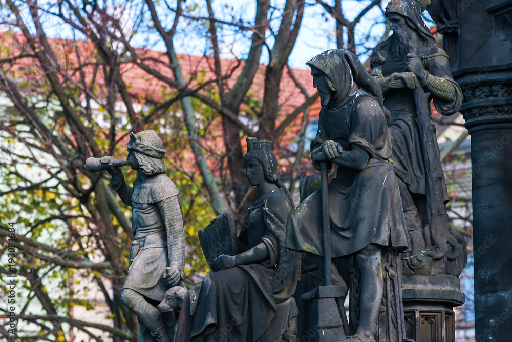 Stone sculpture of peasant family in park Stock Photo | Adobe Stock