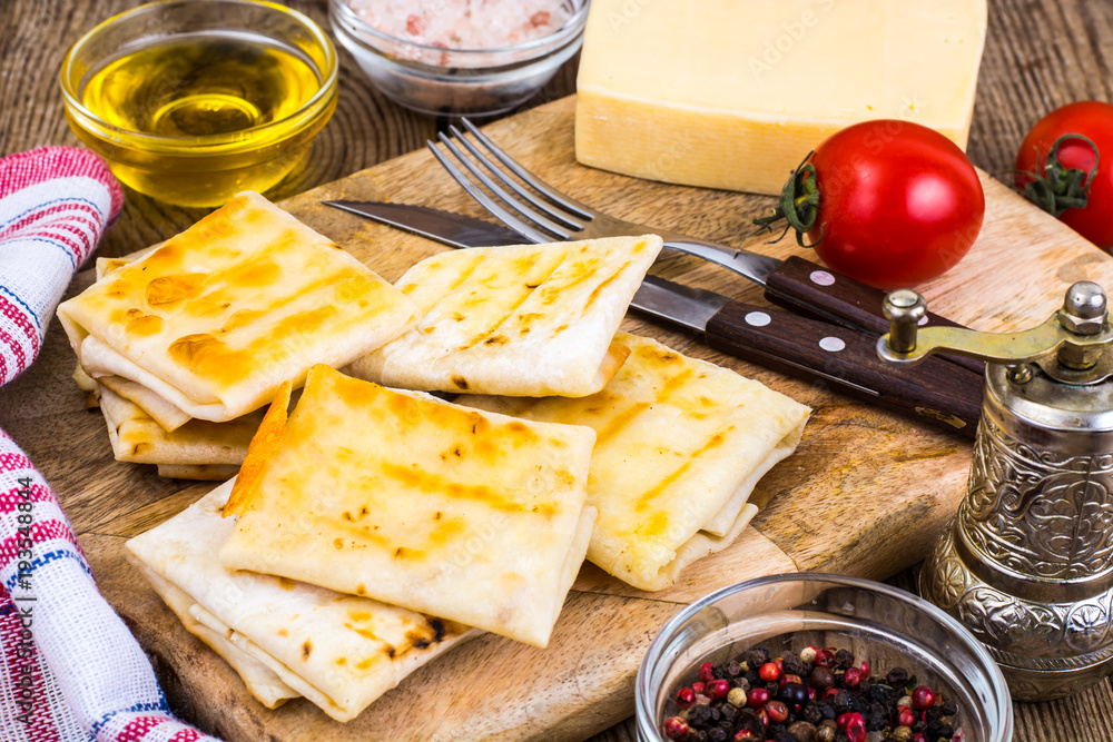 Envelopes of thin Armenian bread lavash fried with crispy crust ...