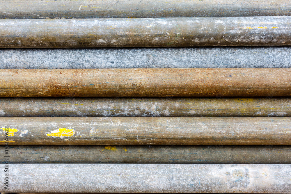 Mental scaffold pipe stack together on scaffold plank wood shelve with ...