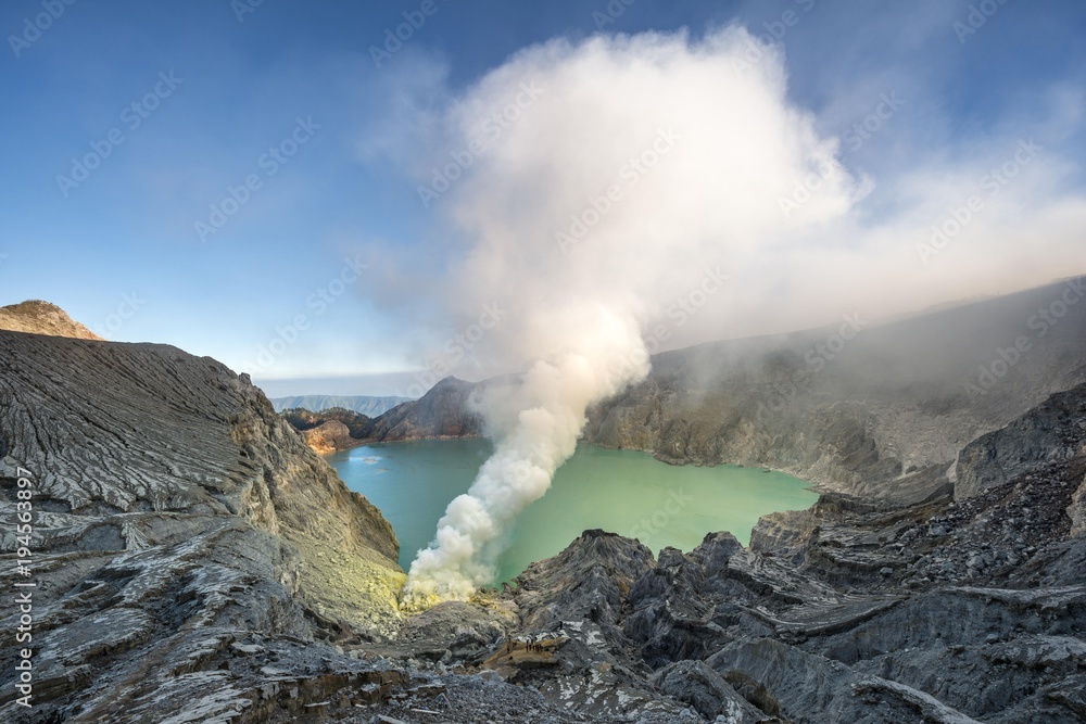 Volcano Kawah Ijen, volcanic crater with crater lake and steaming vents ...